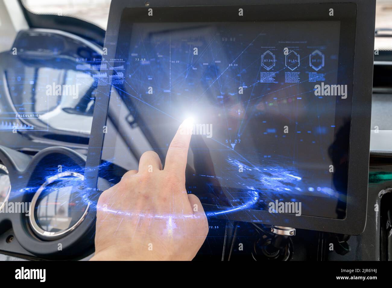 An autonomous vehicle interior with hand touching screen and auto navigation system Stock Photo ...
