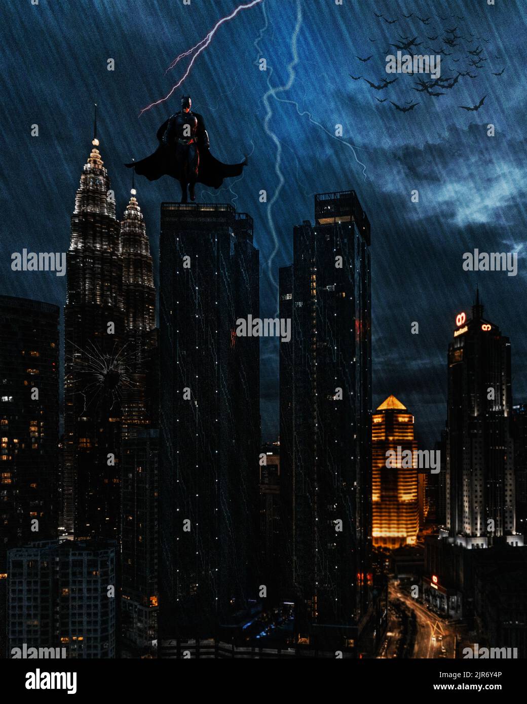 A vertical shot of thunderstorm over the high rise buildings in a city ...