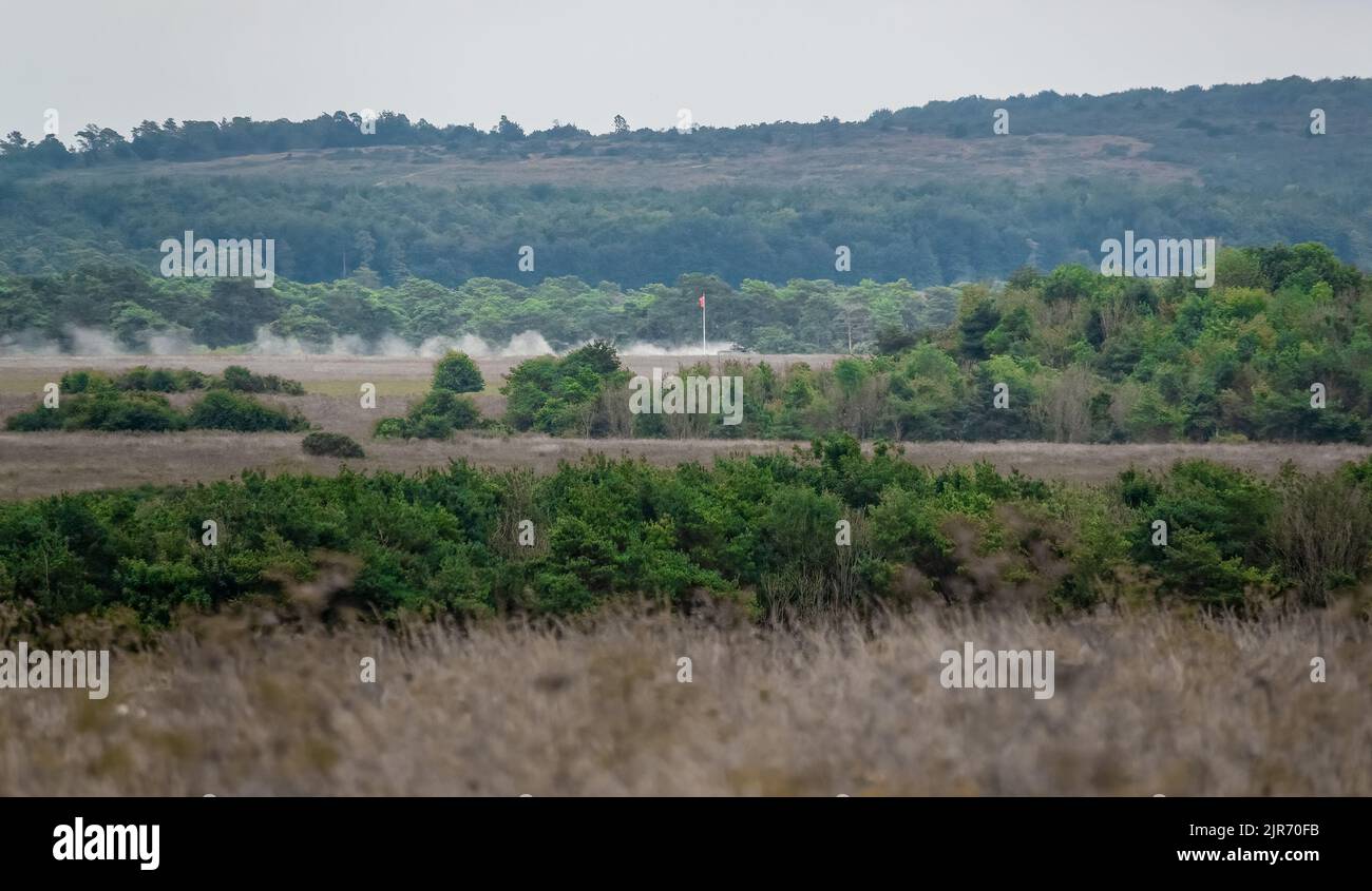 a distant British army Warrior FV510 light infantry fighting vehicle ...