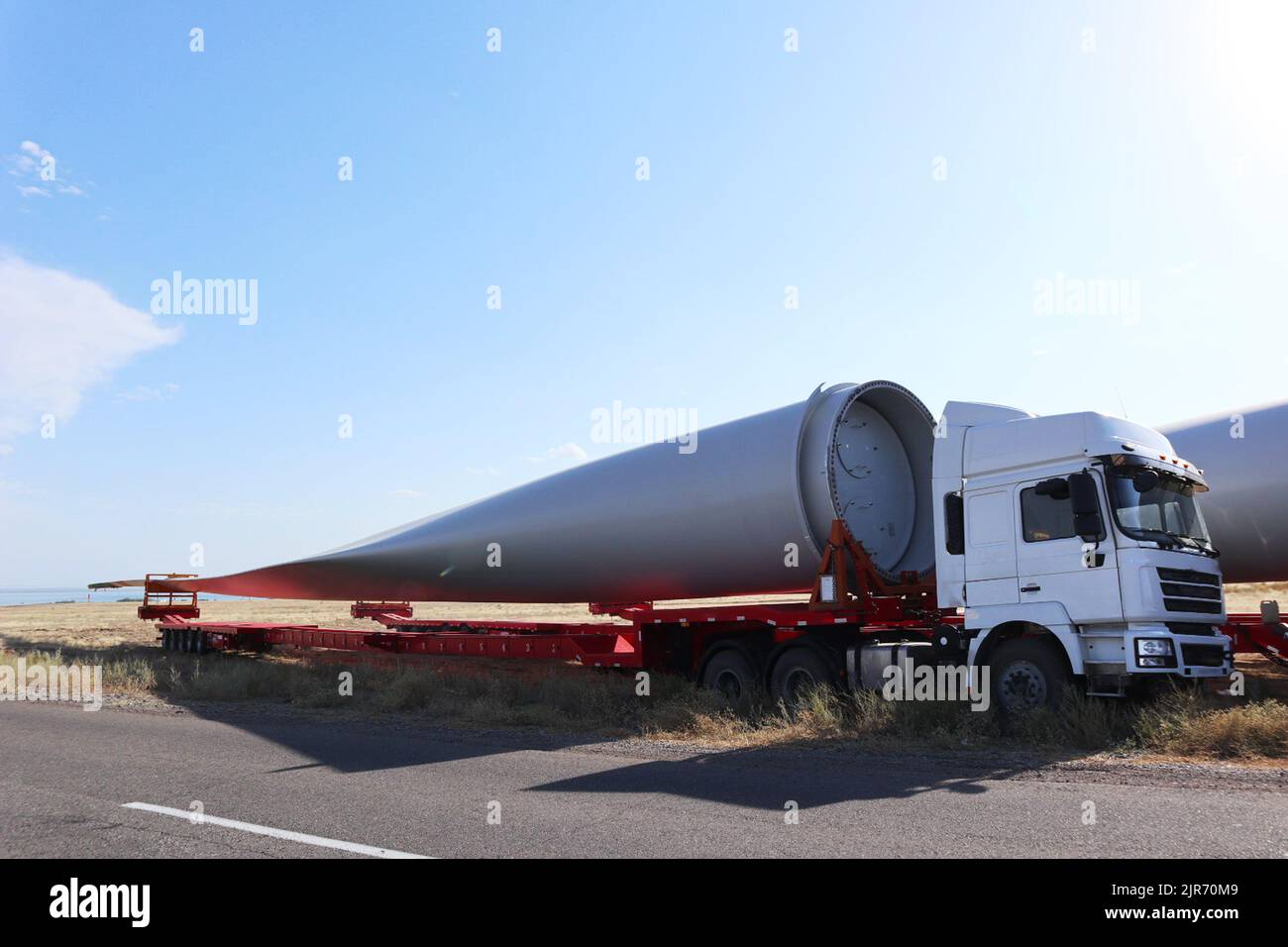 a blade from a wind energy producer on a truck. transportation of ...