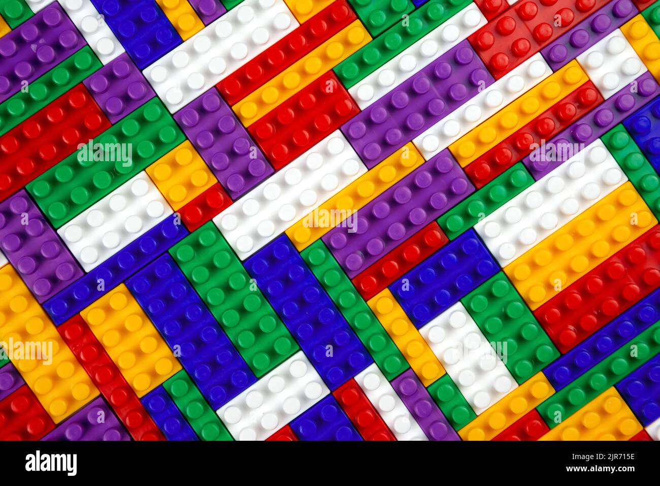 Abstract background texture of colored constructor blocks. Background ...