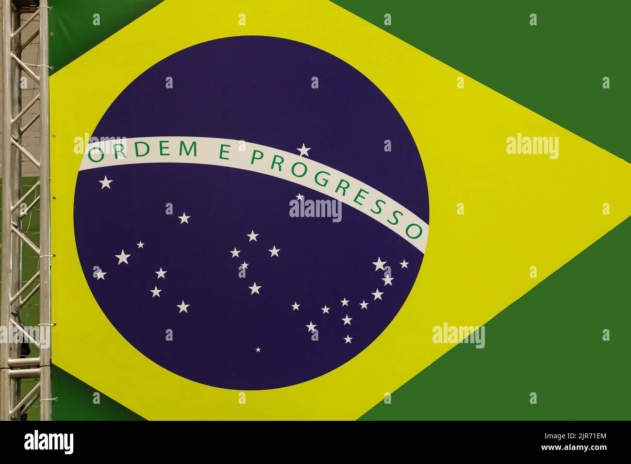 Photo of a banner with a piece of the Brazilian flag, which is composed ...