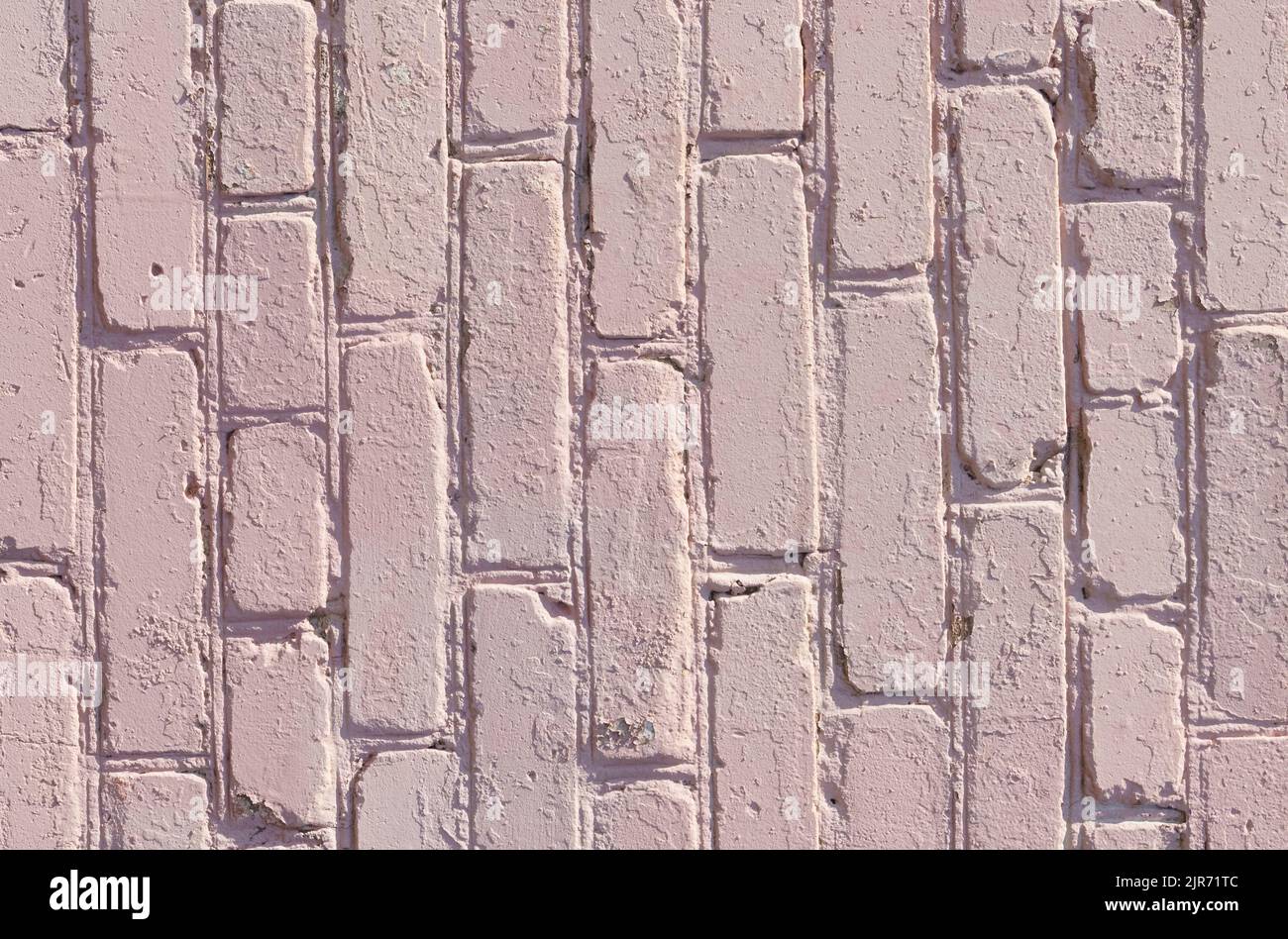 Background texture of pink color brick, building facade decoration ...