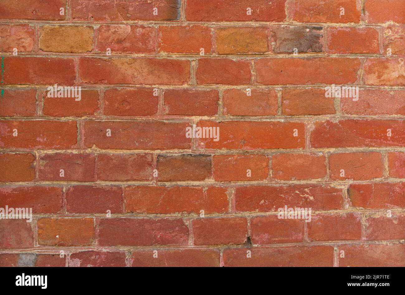 Large texture of a wall lined with red bricks. Close-up. Textures and ...