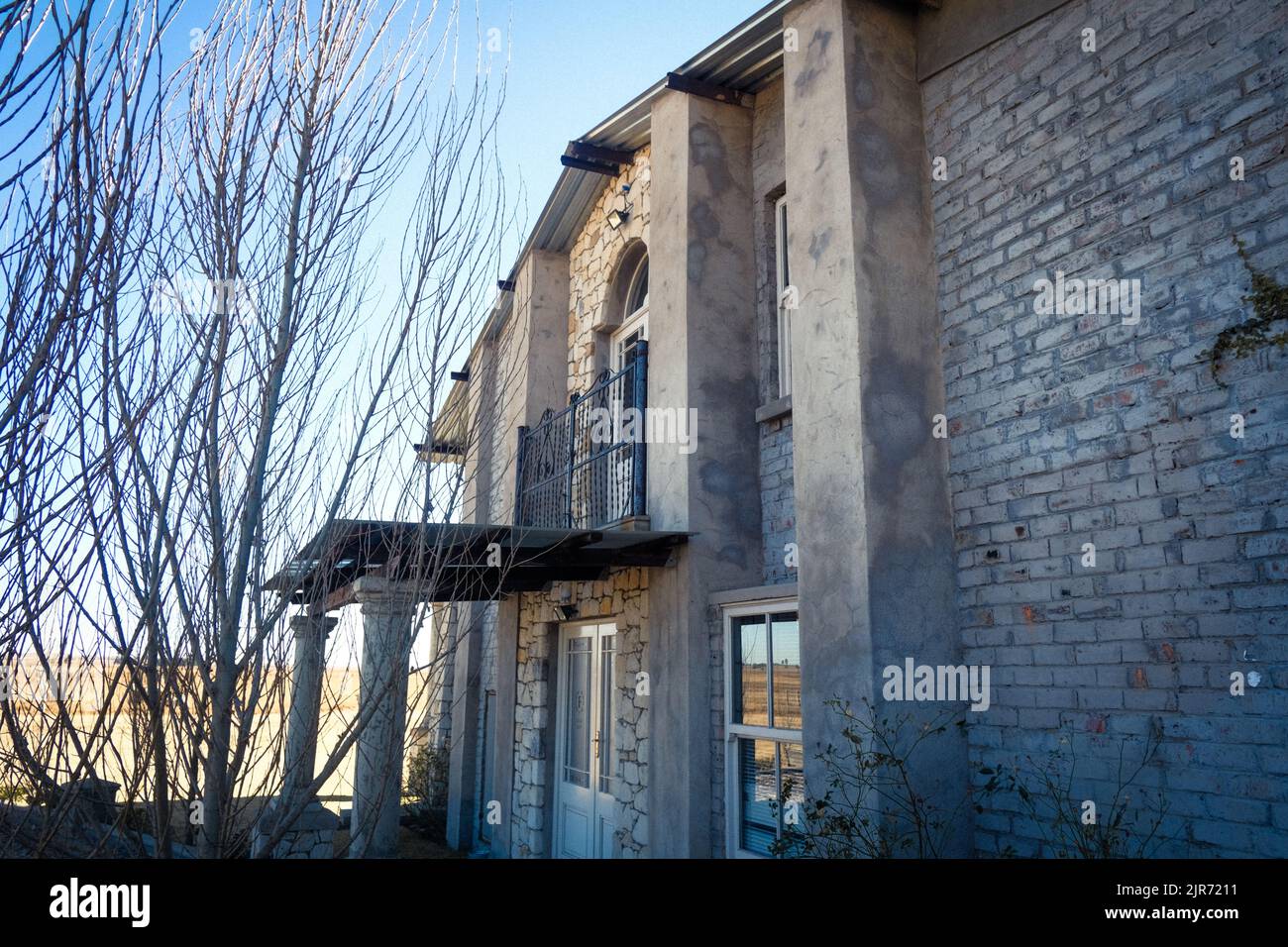 The facade of a simple two-storey building in the countryside Stock ...