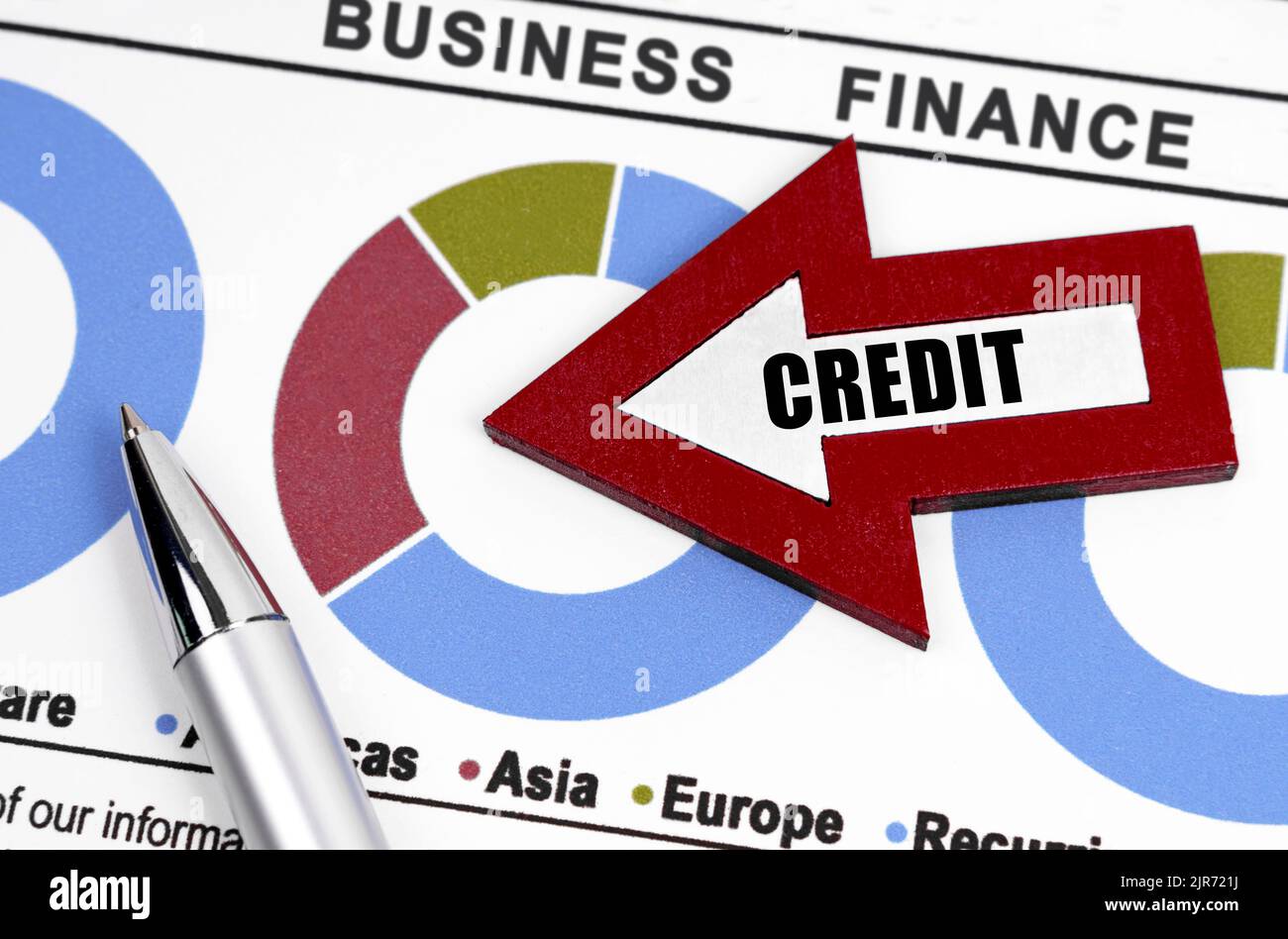 Business concept. Against the background of the diagrams, an arrow with ...