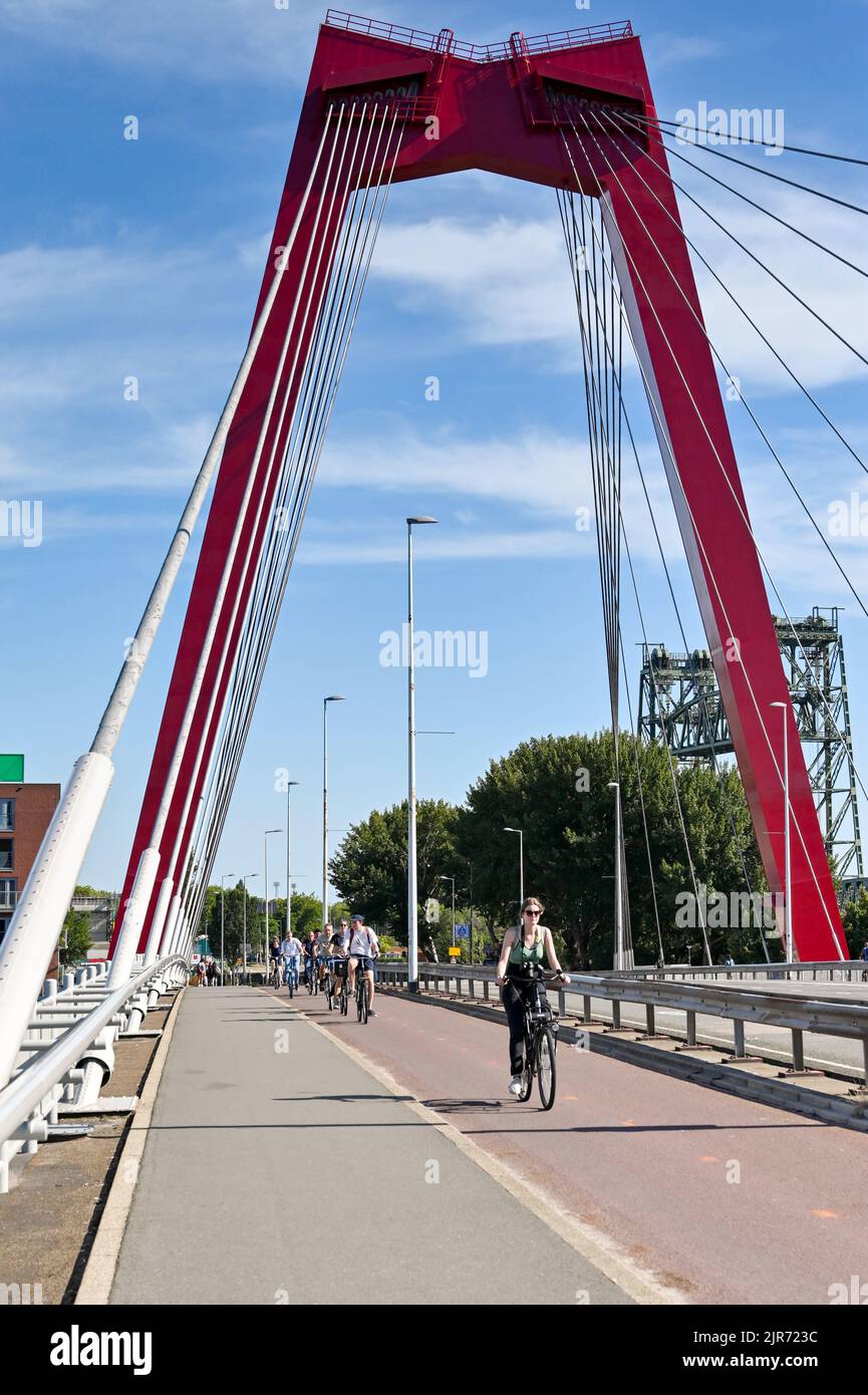 Rotterdam, Netherlands - August 2022: People riding bicycles in the ...
