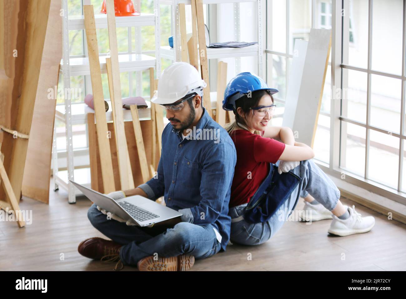 Carpenter grinding joinery product with carvings, finishing woodwork at ...