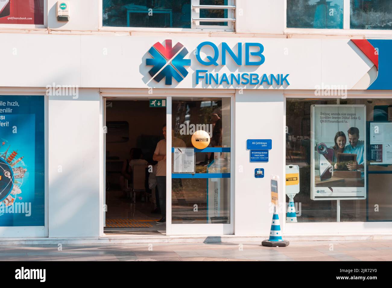 07 July 2022, Antalya, Turkey: QNB finance bank retail branch entrance ...