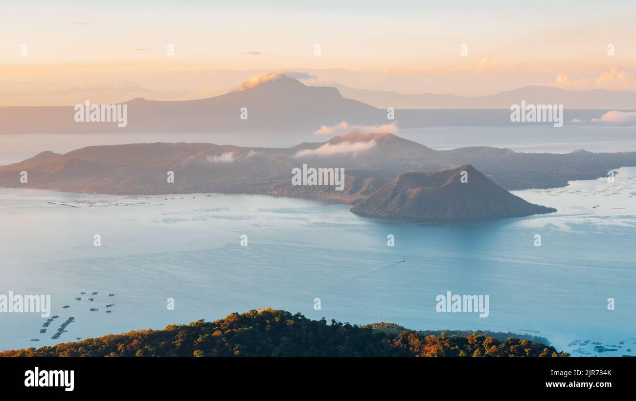A landscape view of Taal Volcano in the Philippines with sunset in the ...