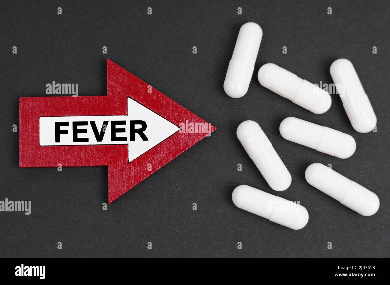 Medicine concept. Tablets are on a black background. They are indicated ...