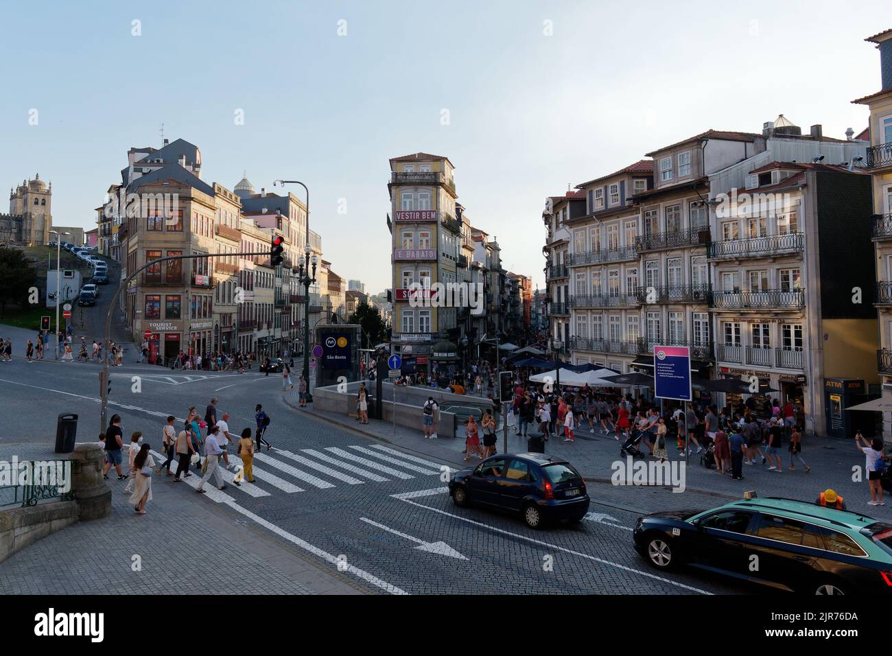 Street scene in Porto Portugal with a road intersection, pedestrian ...