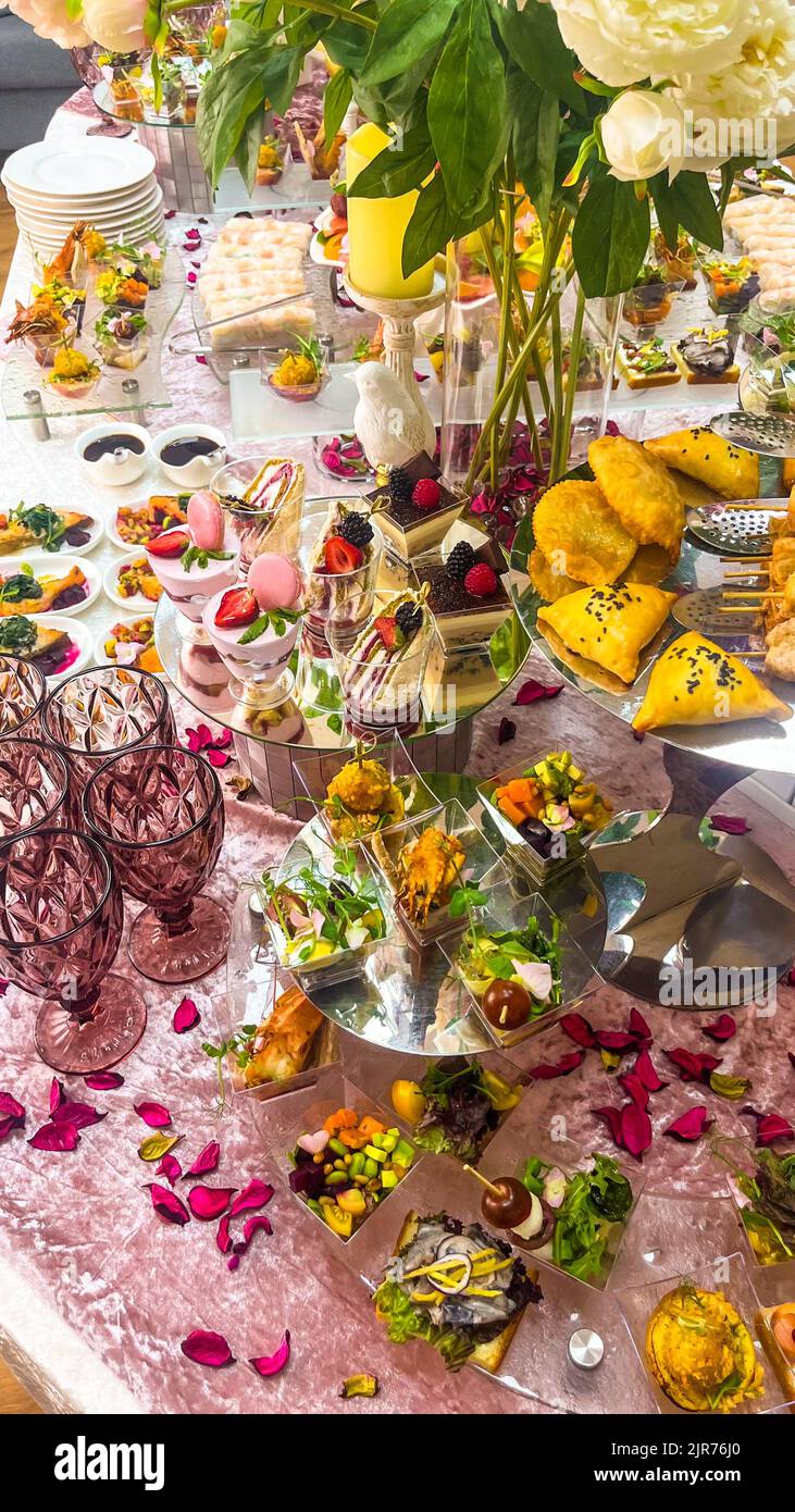 catering table covered with snacks and various dishes top view Stock ...