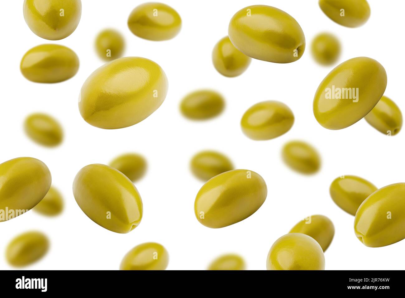 Falling olive isolated on white background, selective focus Stock Photo ...