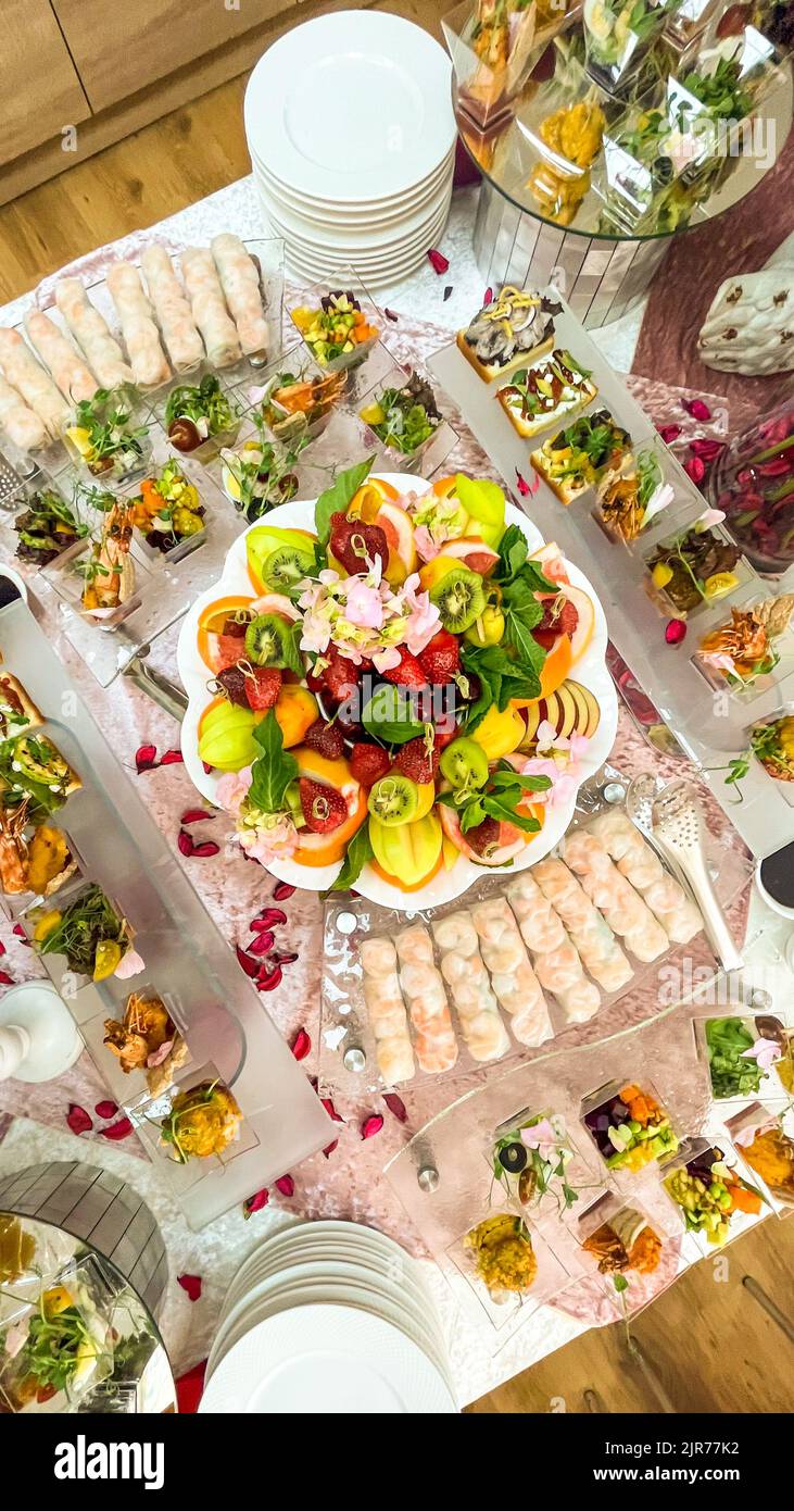 catering table covered with snacks and various dishes top view Stock ...