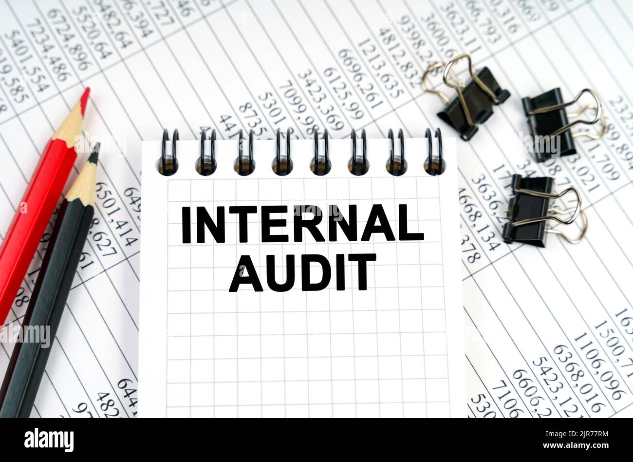 Economy and business concept. On the table are reports, pencils and a ...