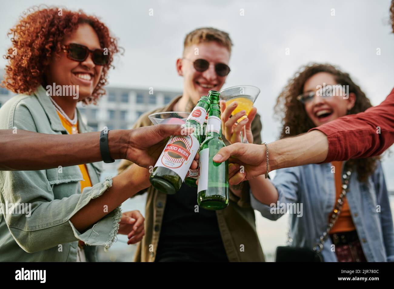 Clink bottles black man hi-res stock photography and images - Alamy