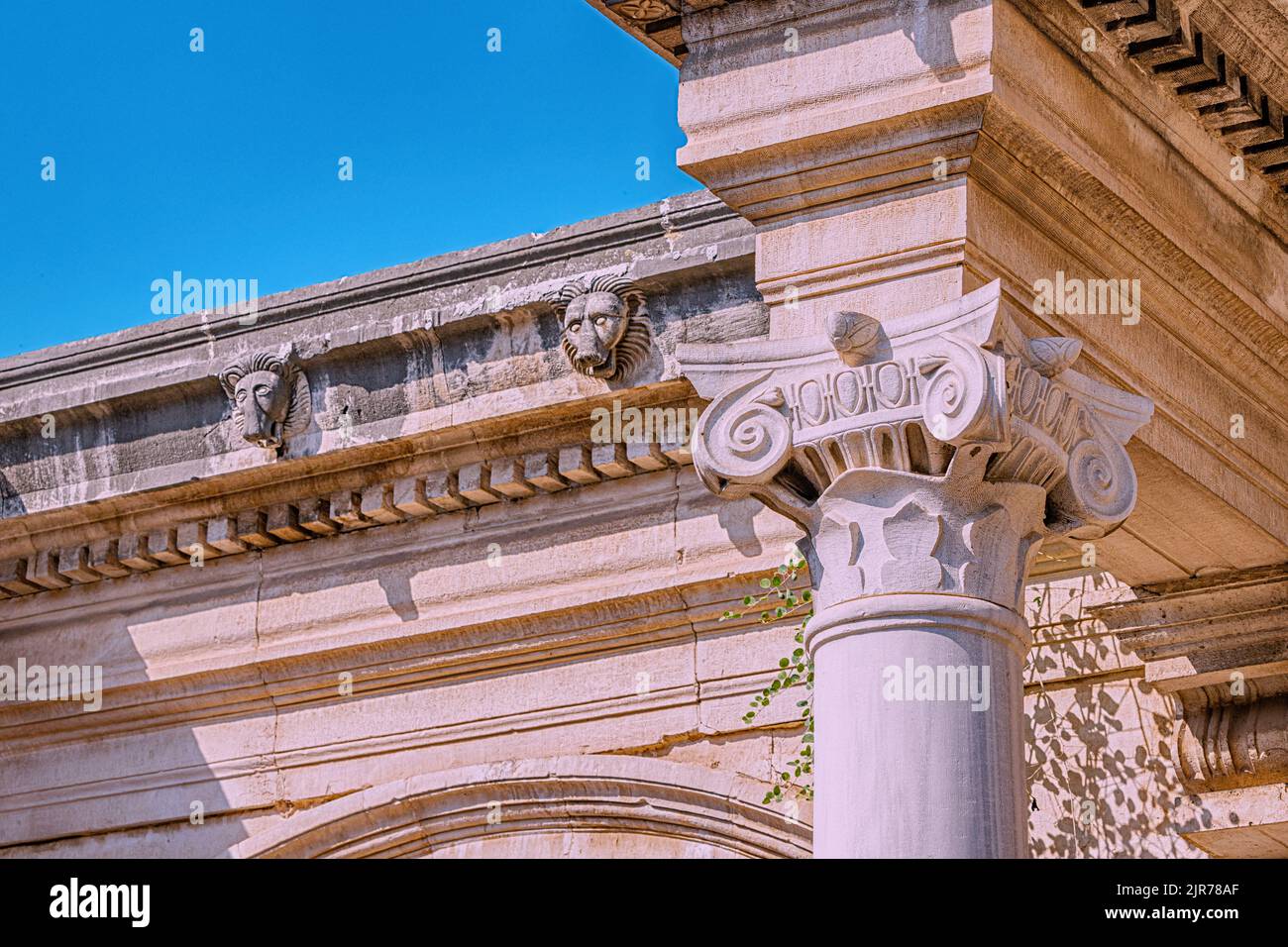 Close-up details of a famous gate or Hadrian's Arch in Antalya. Travel ...