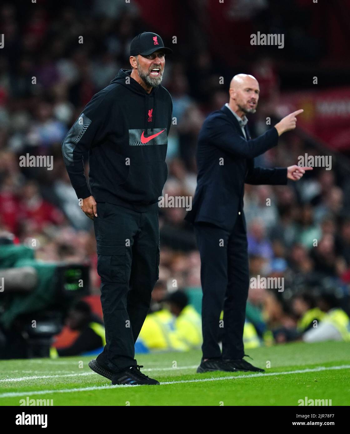 Liverpool Manager Jurgen Klopp Left And Manchester United Manager