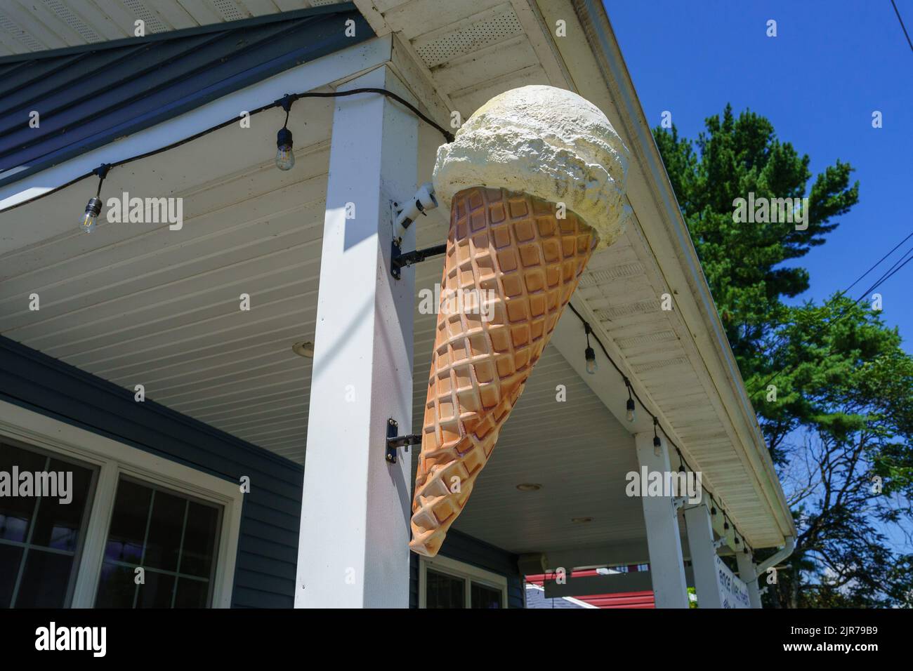 North East, MD, USA - August 19, 2022: A large ice cream cone hangs ...