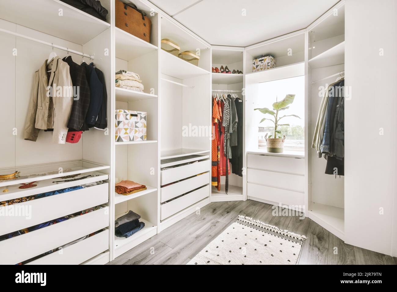 White wardrobe in light room at home Stock Photo - Alamy