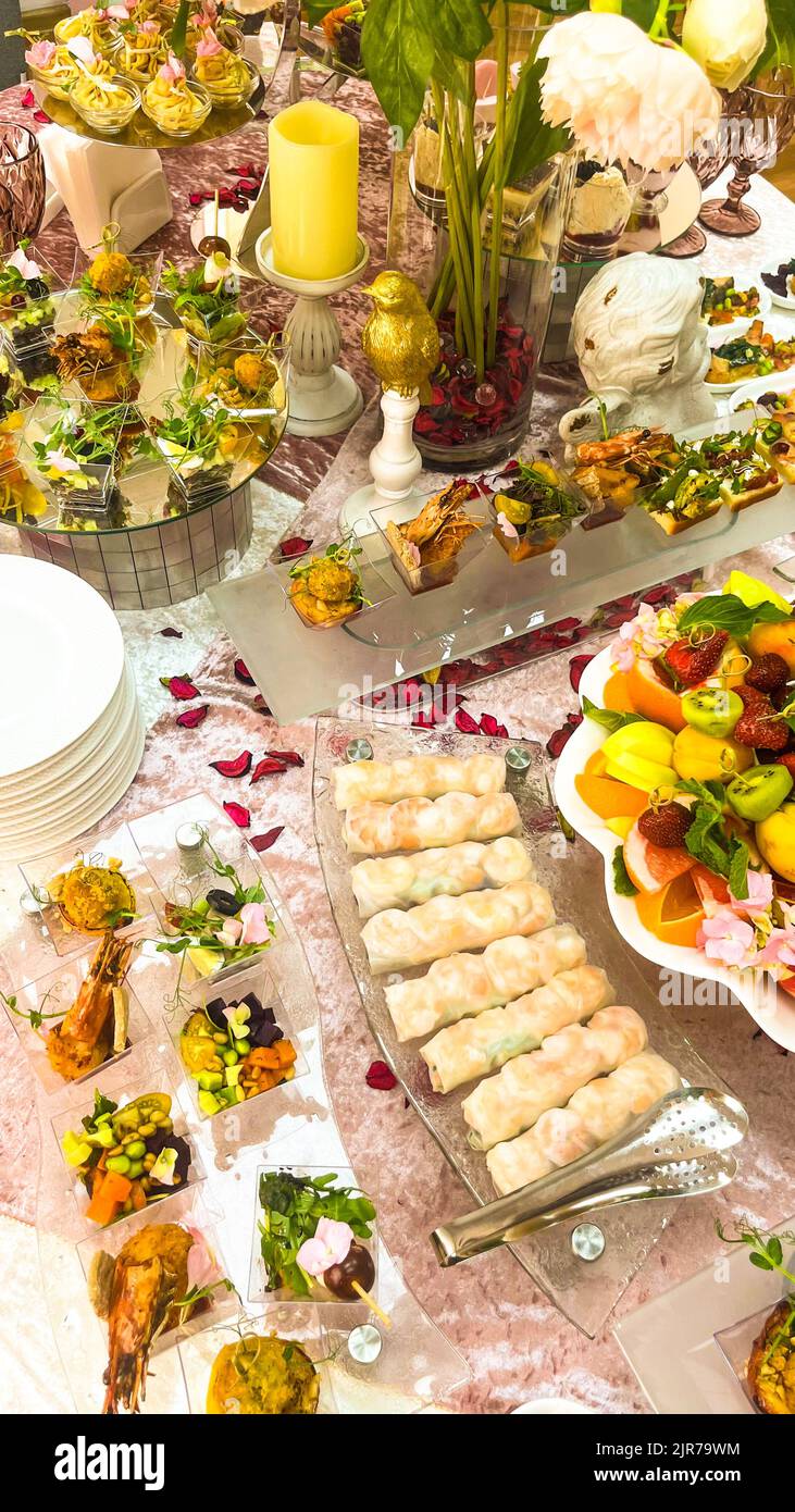 catering table set with snacks and various dishes for the holiday Stock ...