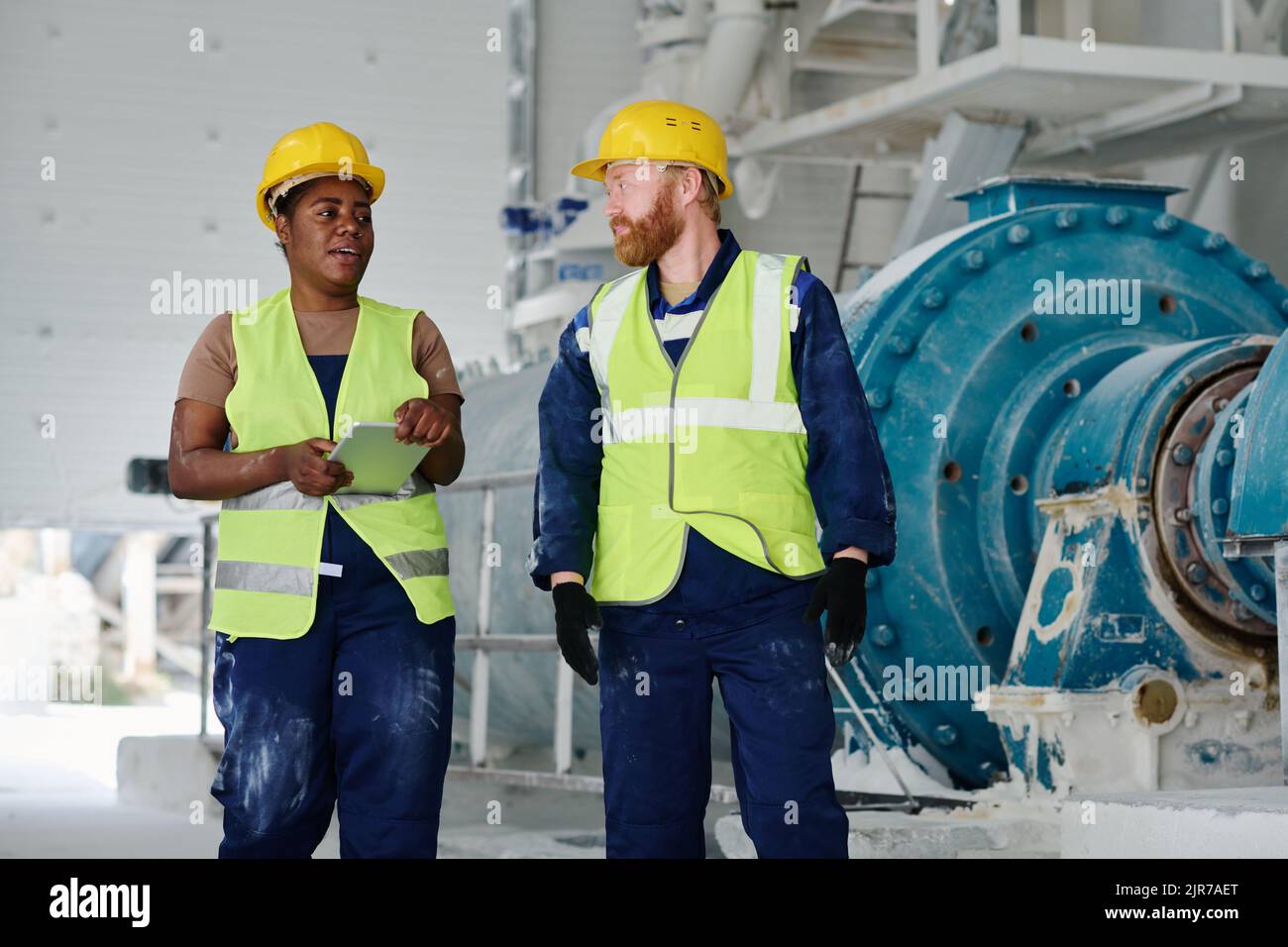 Worker walking along production workshop hi-res stock photography and ...