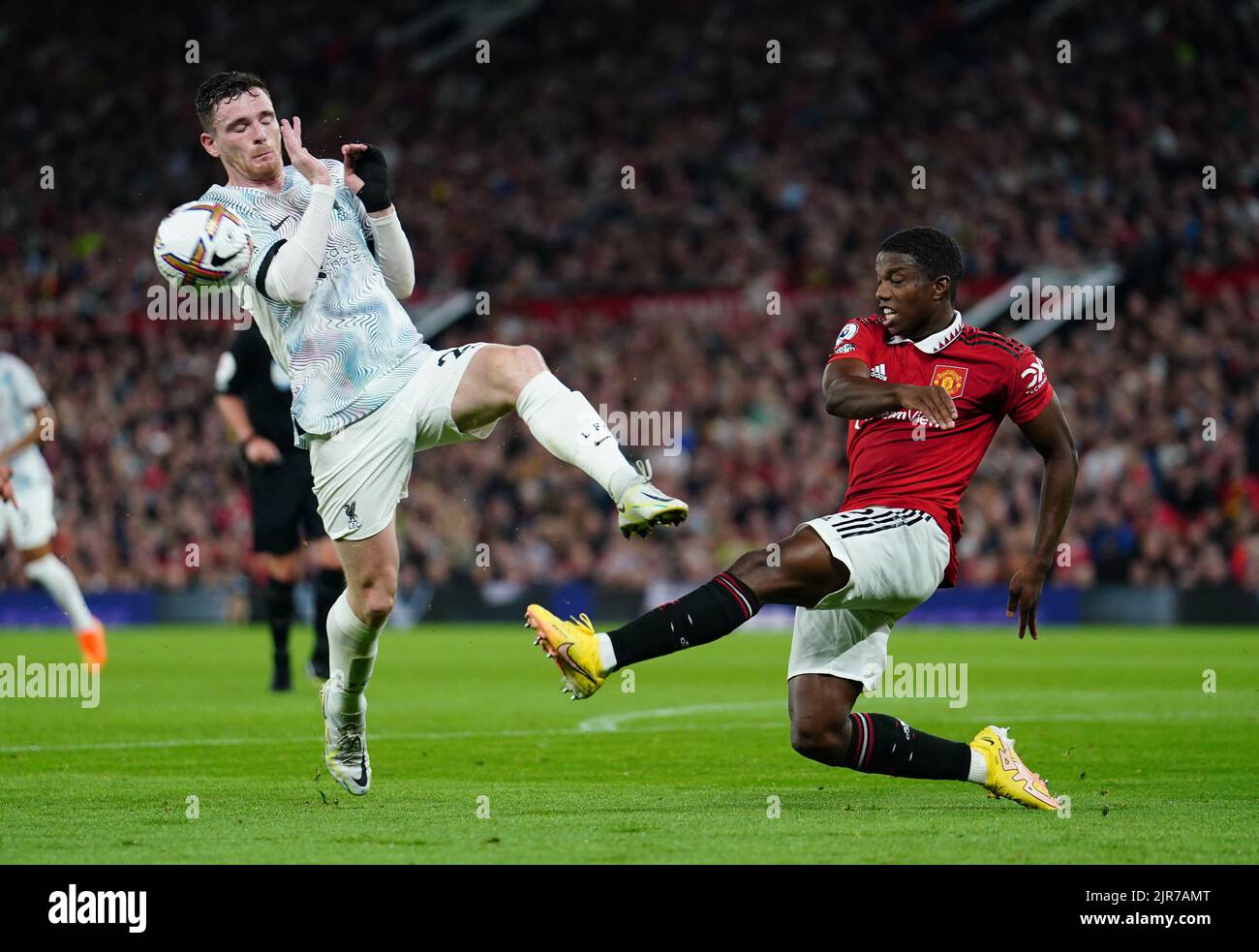 Liverpool's Andrew Robertson (left) and Manchester United's Tyrell ...