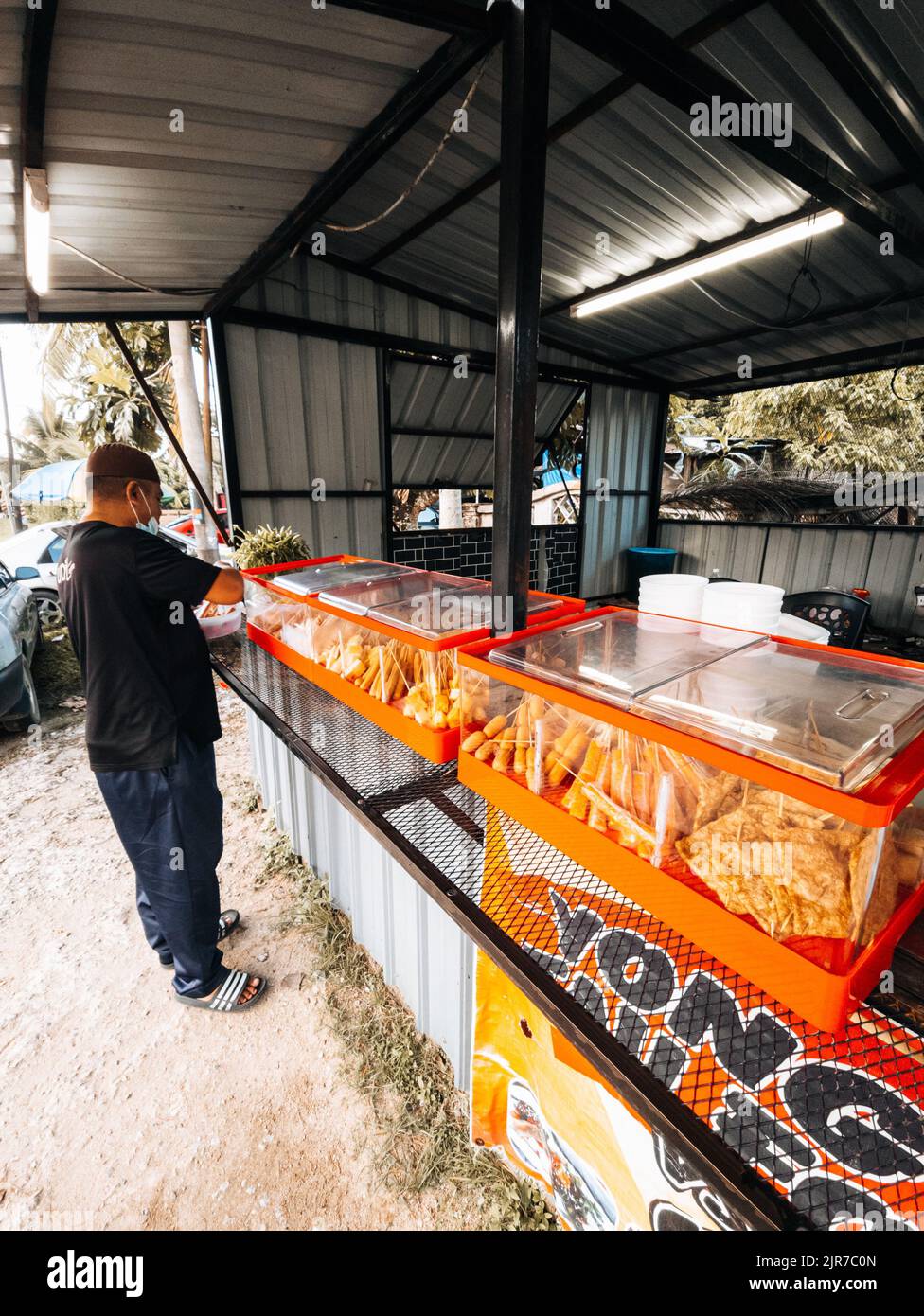 A customer standing in front of the Yong Tau Fu stall and waiting for ...