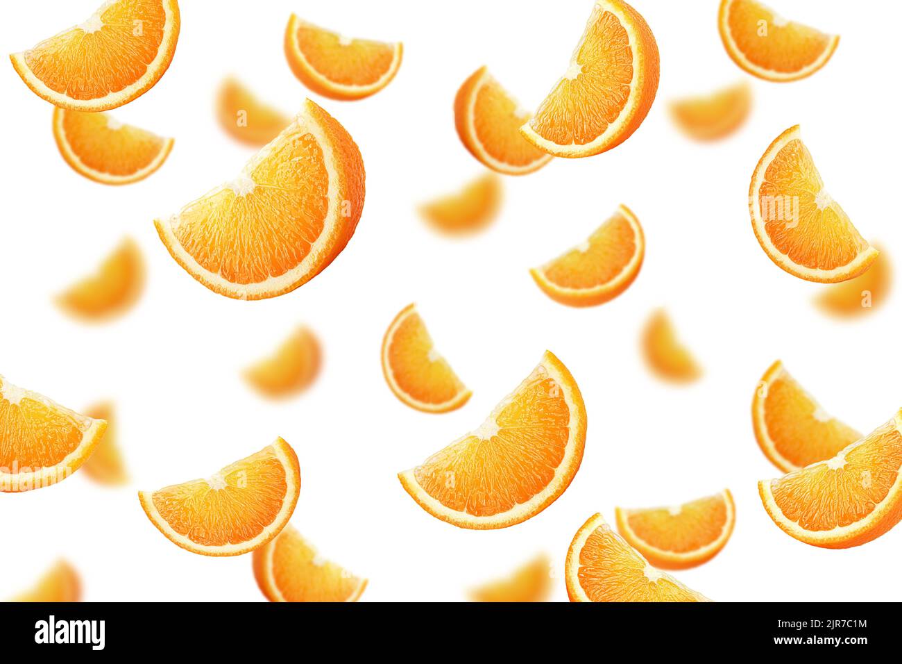 Falling orange slice isolated on white background, selective focus ...