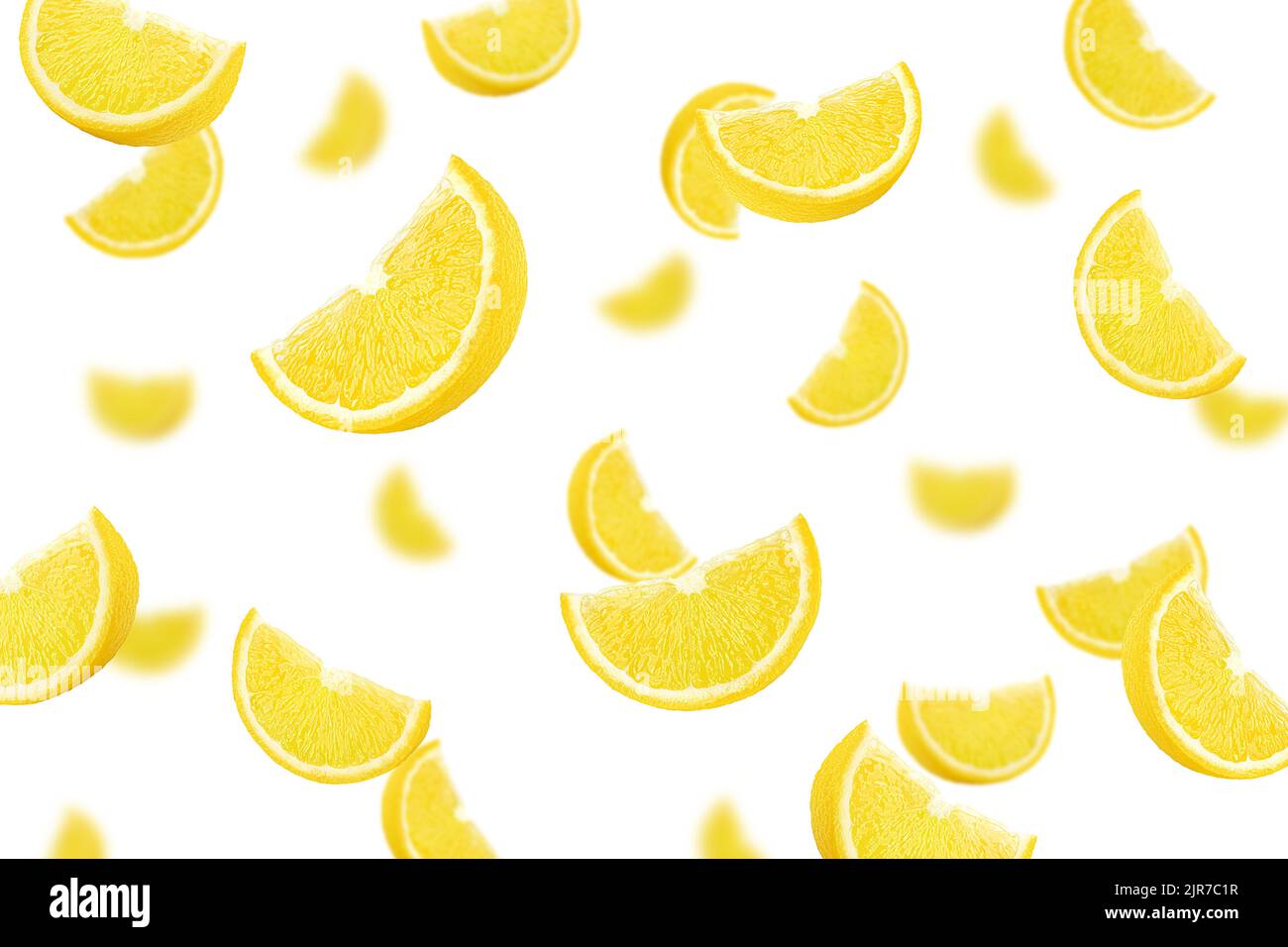 Falling lemon slice, isolated on white background, selective focus ...