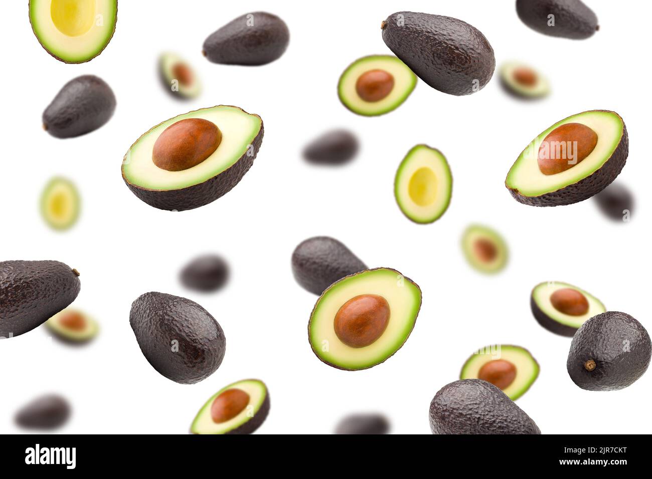 Falling avocado, isolated on white background, selective focus Stock ...