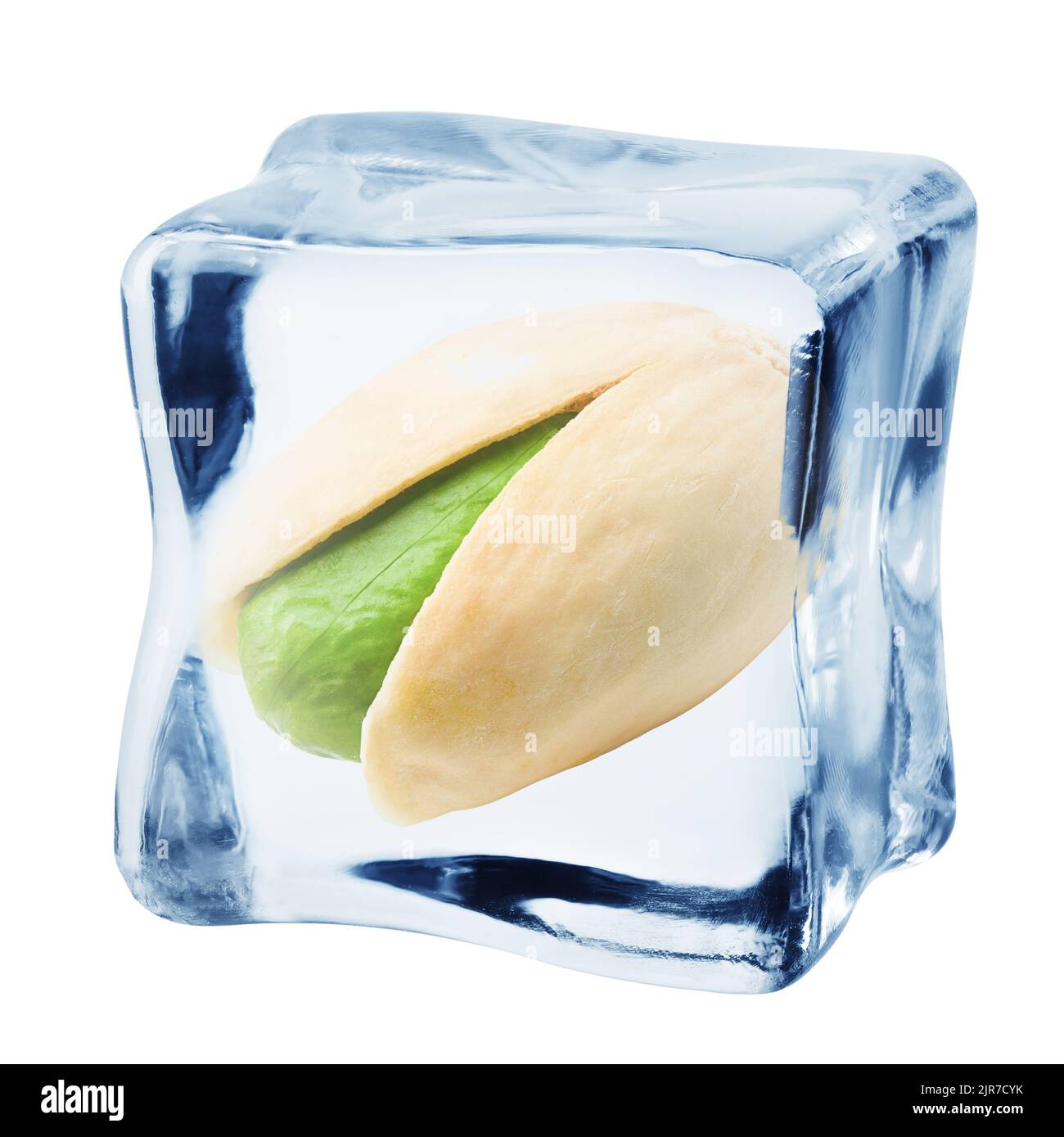 pistachio in ice cube, isolated on white background, clipping path ...