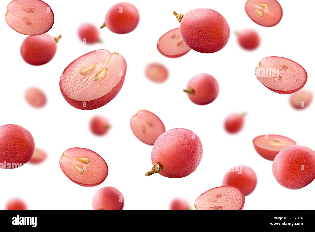 Falling red grape, isolated on white background, selective focus Stock ...