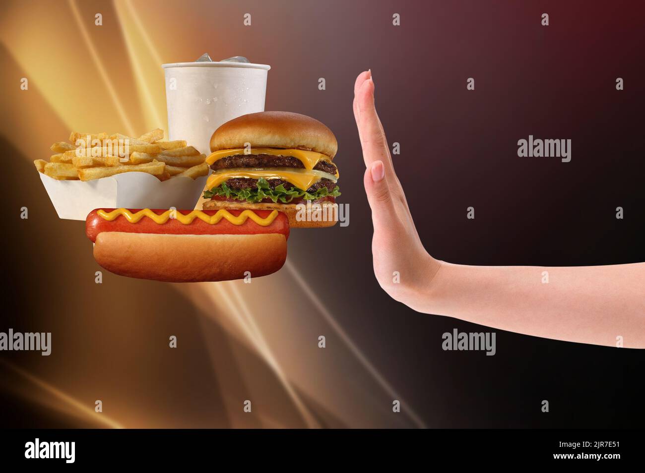 Hand refusing junk food Stock Photo - Alamy
