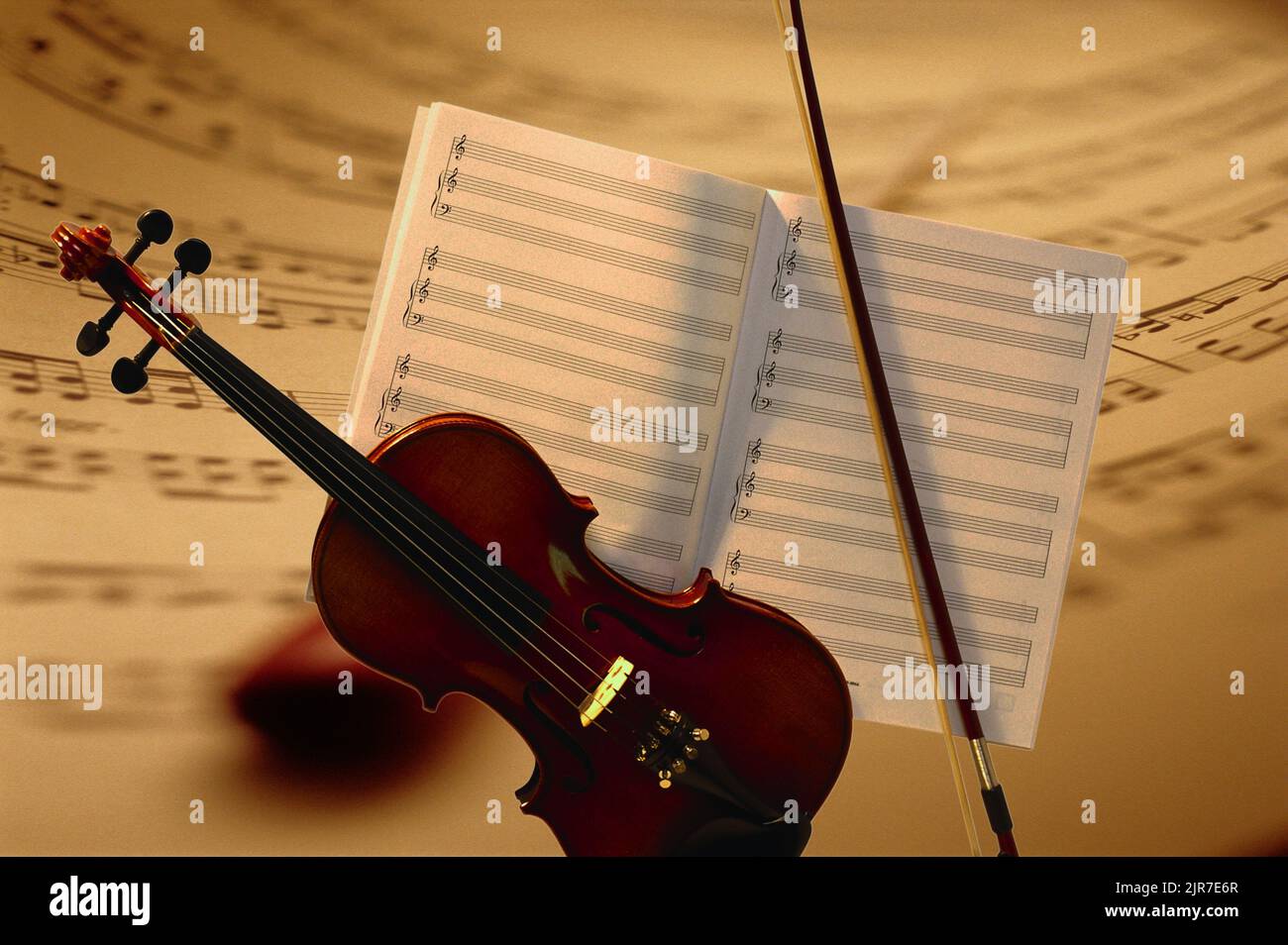 Violin against classical partition Stock Photo - Alamy