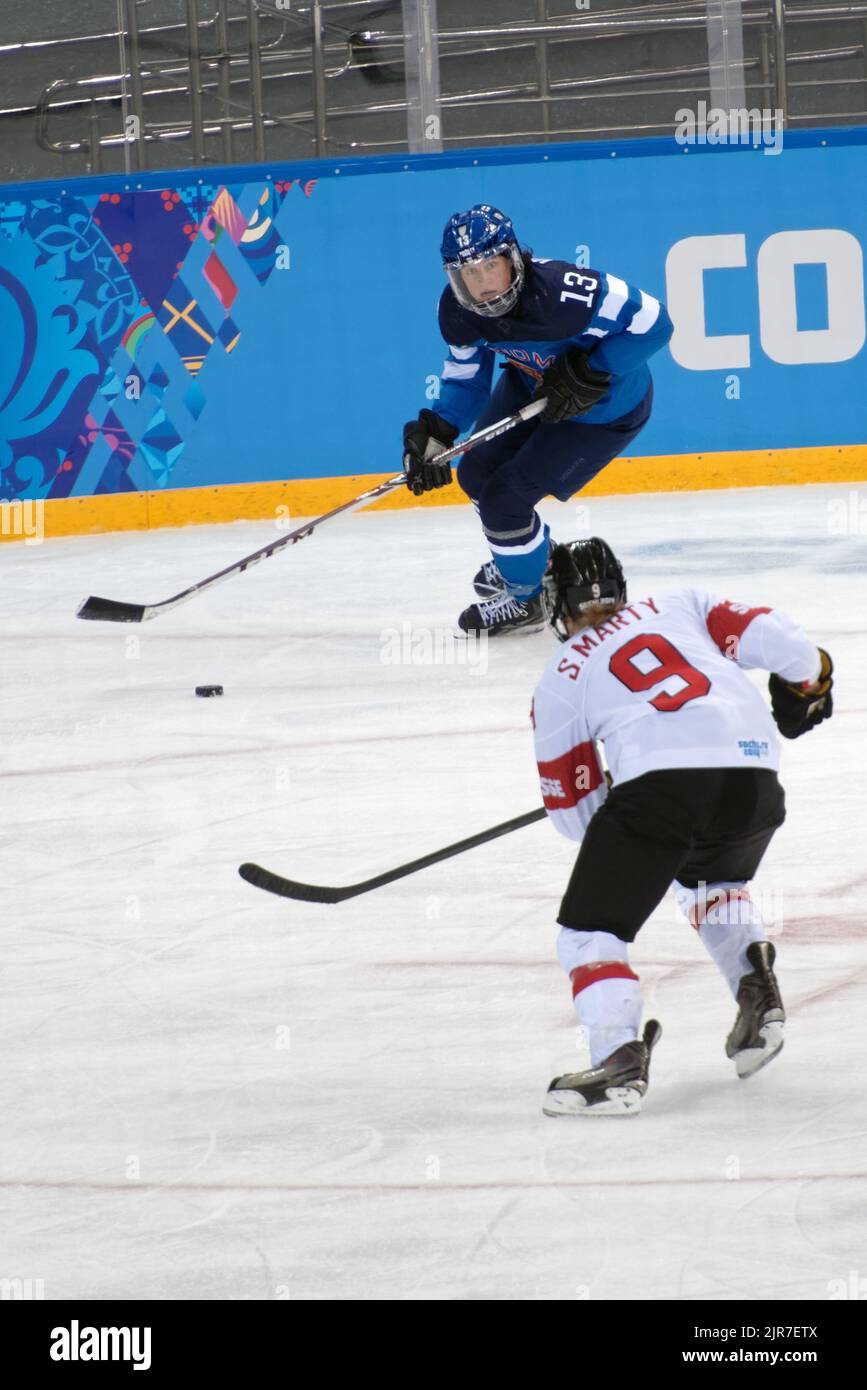 Woman ice hockey match of Winter Olympics Finland (blue) vs Switzerland ...