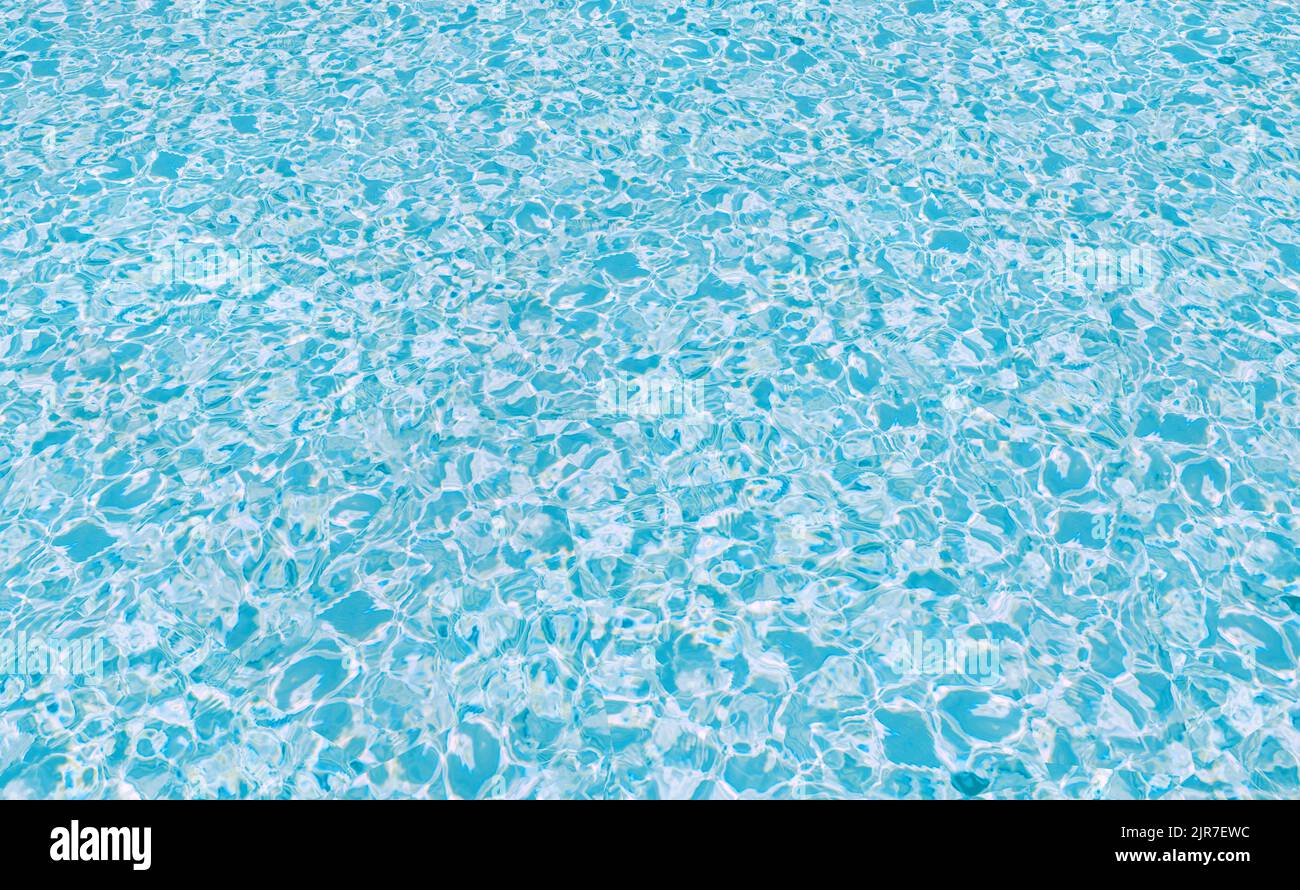 Closeup of desaturated transparent clear calm water surface texture ...