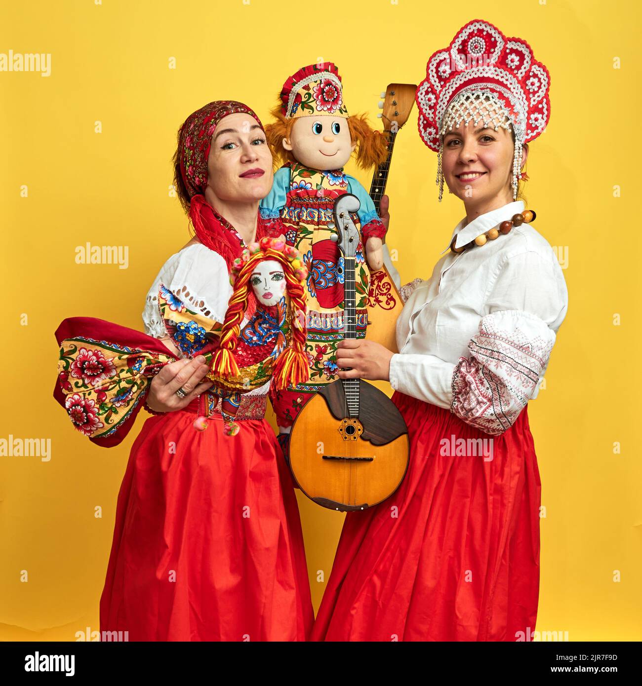 Women musicians in Russian folk dresses with musical instruments on a ...
