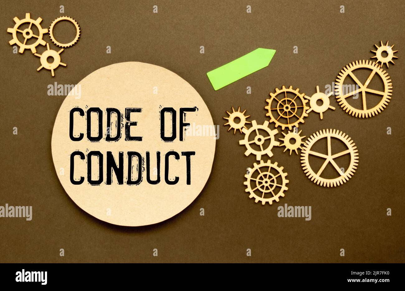 Business Concept Notebook With Text Code Of Conduct On Pink Paper With Magnifier Keyboard And