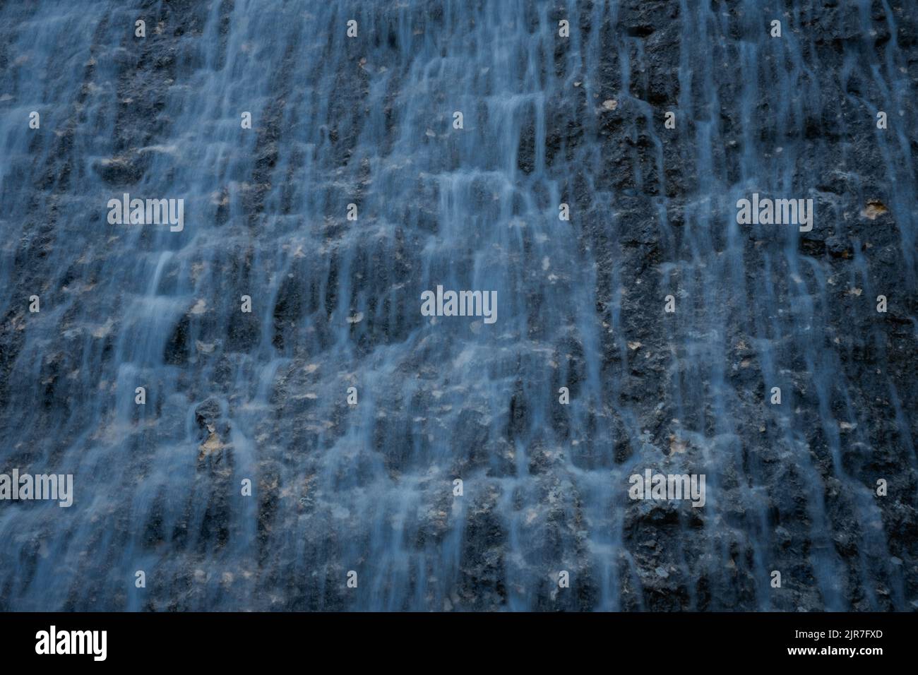 Waterfall texture. Background of the falling purest mountain water. A ...