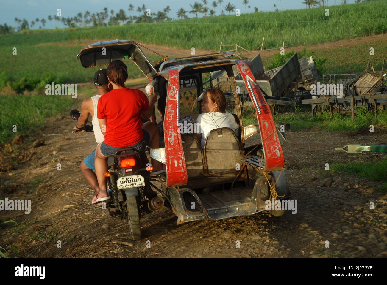 Trike carrying passengers, Sugar Cane Farm, Cadiz City, Negros ...