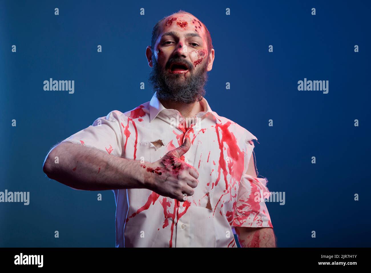 Halloween zombie man giving hi-res stock photography and images - Alamy