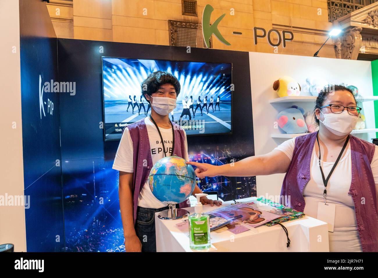New York, NY - August 22. 2022: A woman points location of South Korea ... New York, NY - August 22. 2022: A woman points location of South Korea ...