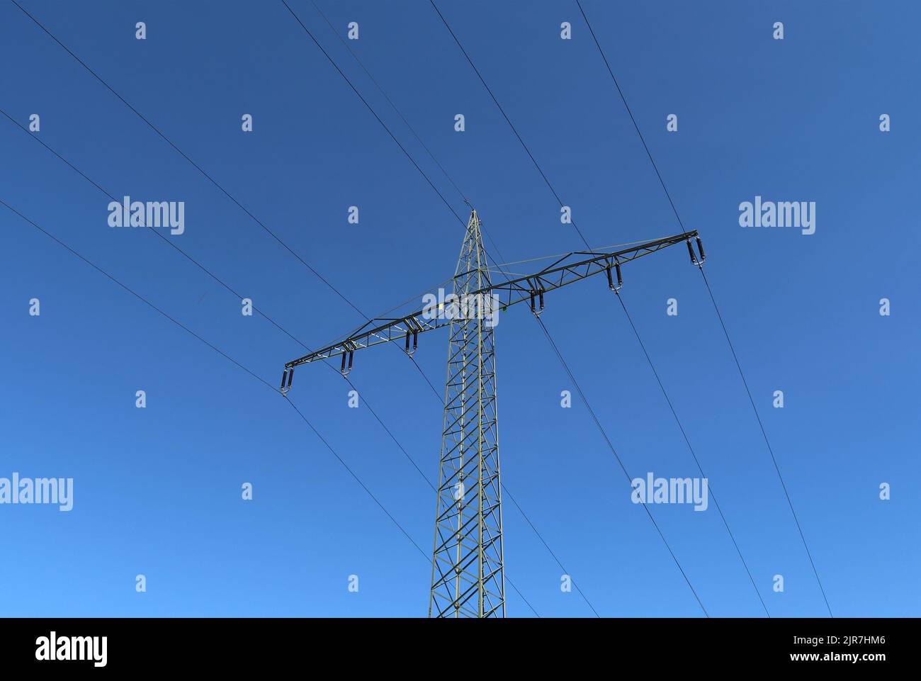 View of very large electricity pylons with high voltage cables from a ...