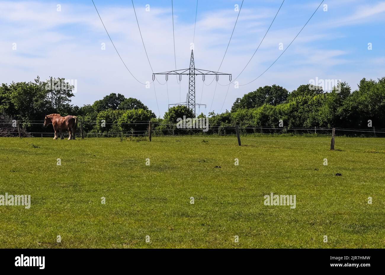 View of very large electricity pylons with high voltage cables from a ...