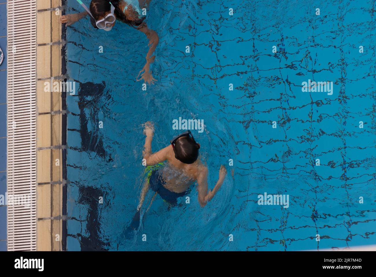 Children playing water argentina hi-res stock photography and images ...