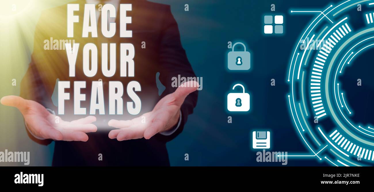 Sign displaying Face Your Fears. Word for Have the courage to overcome ...