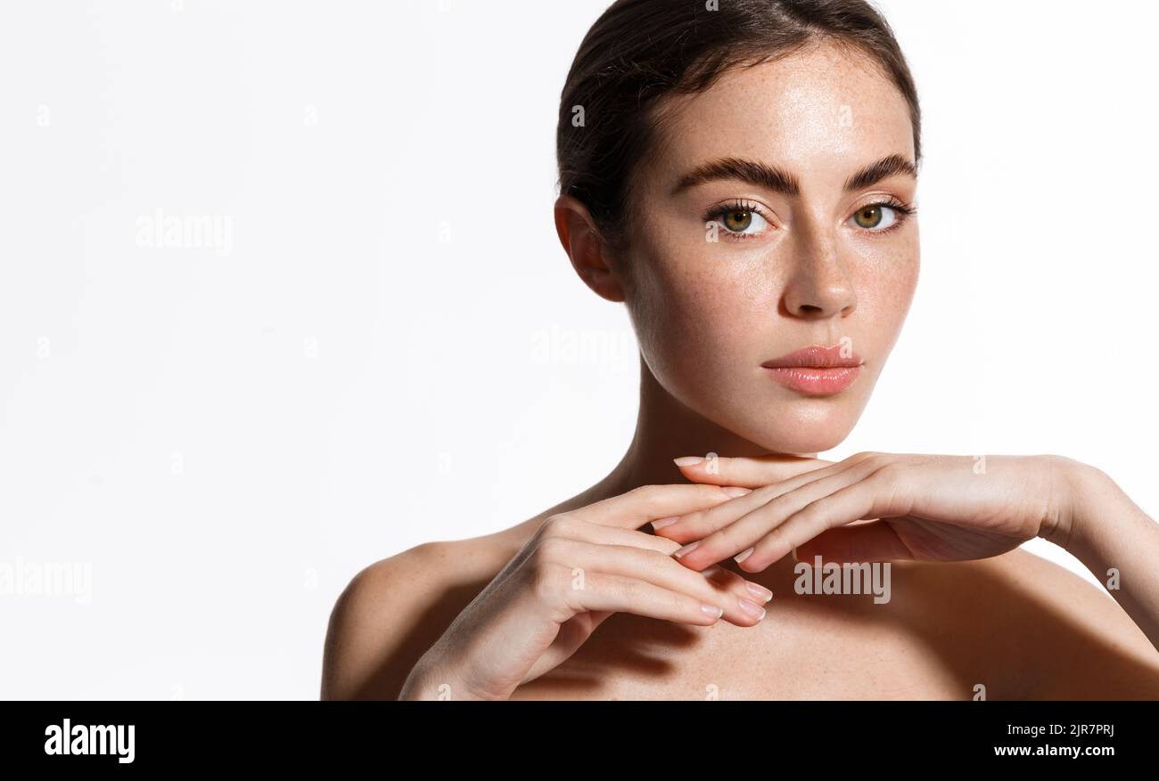Attractive female model with natural makeup, glowing healthy skin after ... Attractive female model with natural makeup, glowing healthy skin after ...