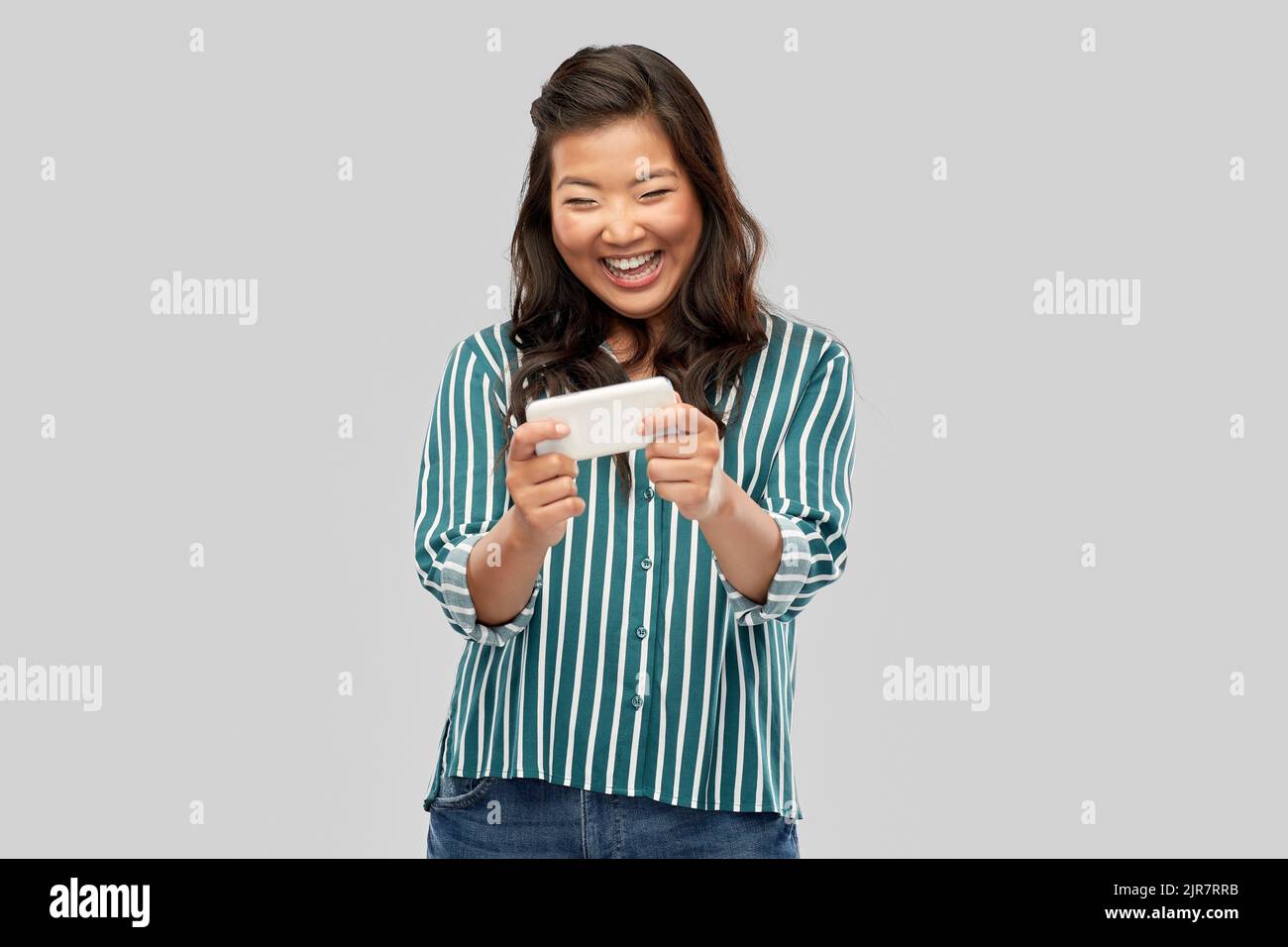 Happy asian woman using hi-res stock photography and images - Alamy